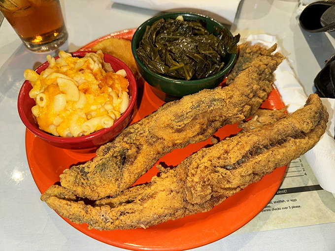 That cornmeal-crusted trout alongside mac and cheese and collard greens is the kind of plate that makes you want to hug the chef.