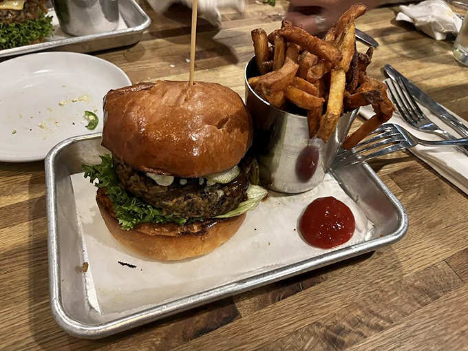 Even the veggie burger gets the royal treatment, with crispy onion rings and fresh greens. Plant-based never looked so tempting.