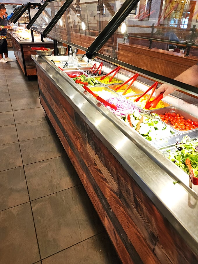 A salad bar that actually tries! Fresh veggies in vibrant colors prove that "all-you-can-eat" doesn't have to mean "all-you-can-regret."