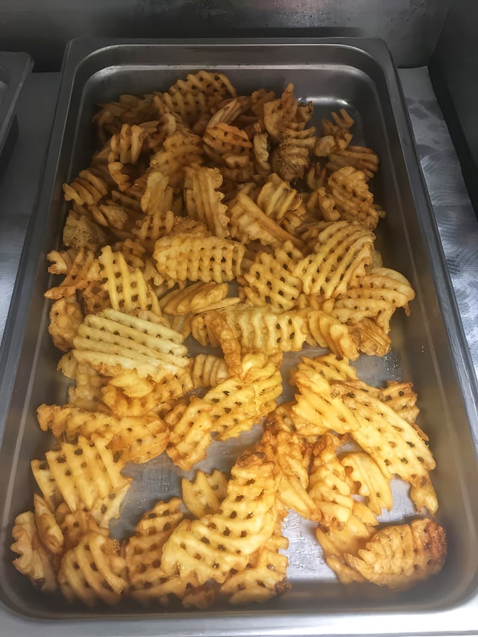 Not just any fries &ndash; these waffle-cut beauties have the perfect ratio of crispy exterior to fluffy potato interior. A textural masterpiece.