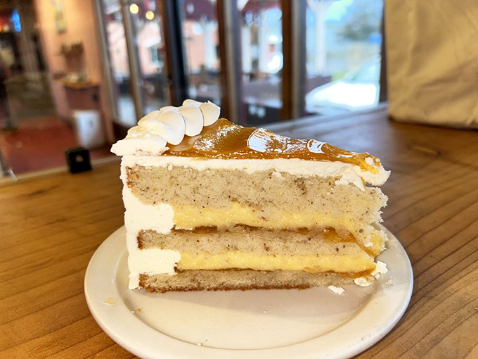 This cake belongs in the "too pretty to eat" category, until you taste it and realize aesthetics should never stand between you and joy.