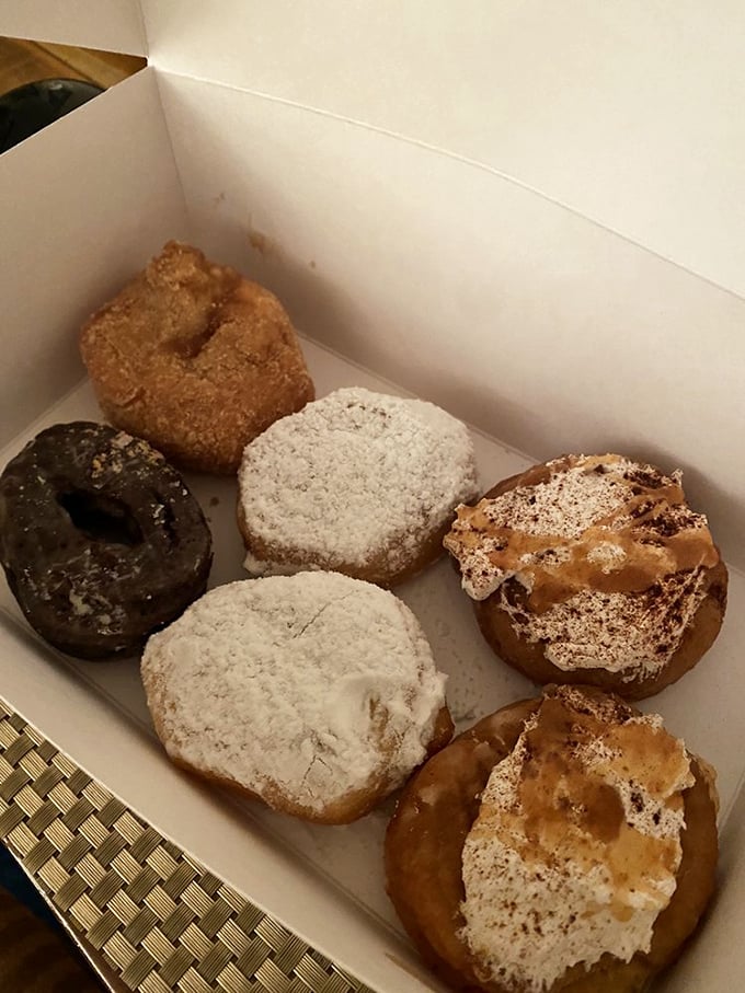 A box of assorted joy that makes decision paralysis a delicious problem to have. Six different donuts, six different ways to make your day better.