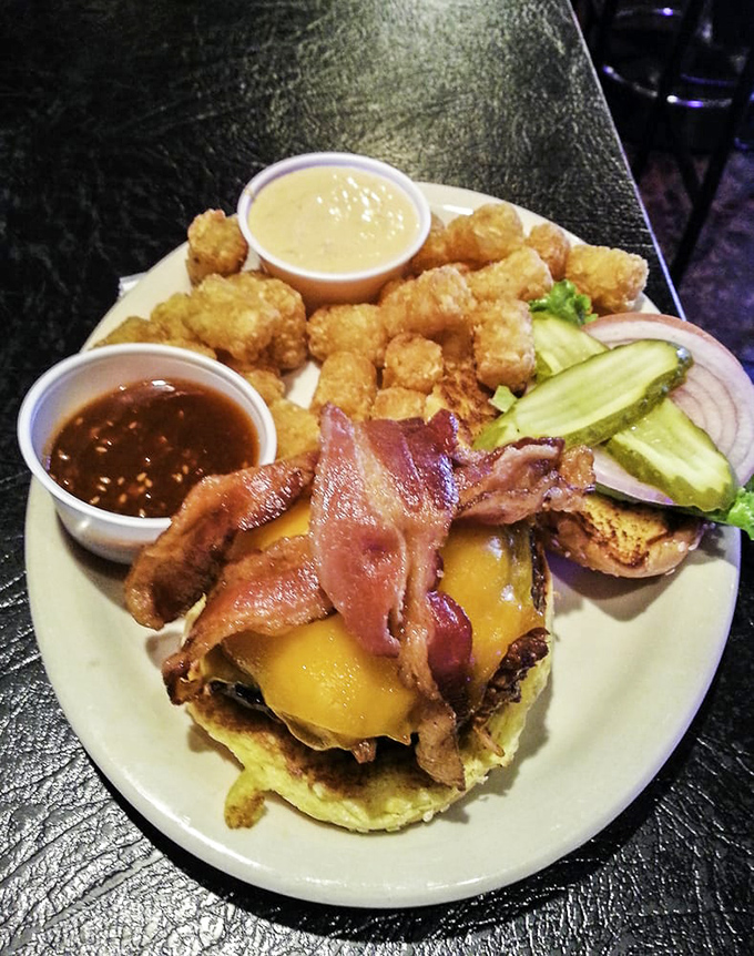 The bacon cheeseburger with tots combo: where childhood comfort food gets its graduate degree in indulgence. No adulting required.