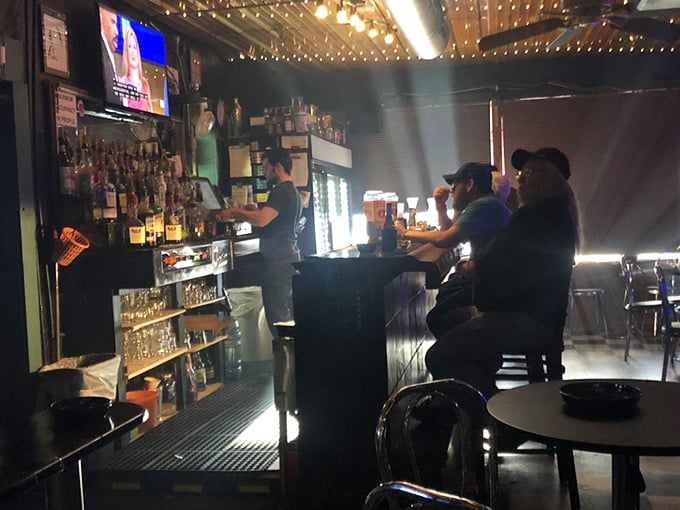 In the glow of neon and TV screens, strangers become friends and regulars become family&mdash;the universal alchemy of a great neighborhood bar.