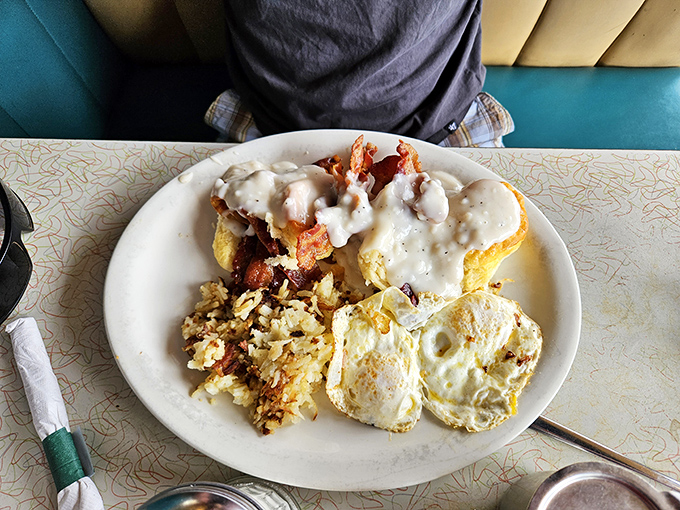 Biscuits and gravy: the Southern breakfast that asks the important question, "Why settle for ordinary when you can have a cloud of carbs swimming in savory gravy?"