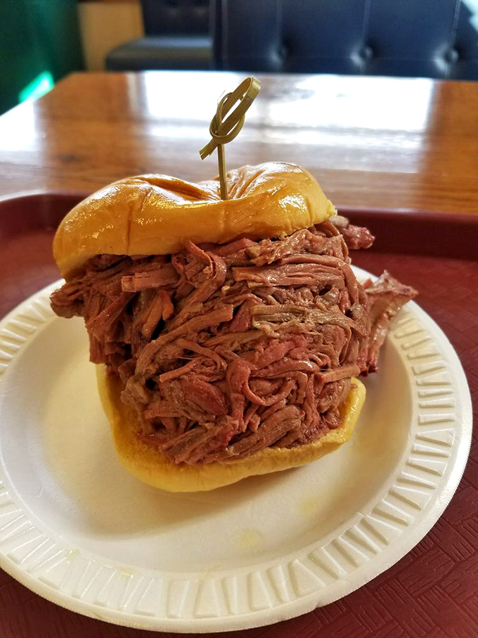 The sandwich that launched a thousand road trips. This architectural marvel of beef brisket defies gravity and conventional sandwich physics.
