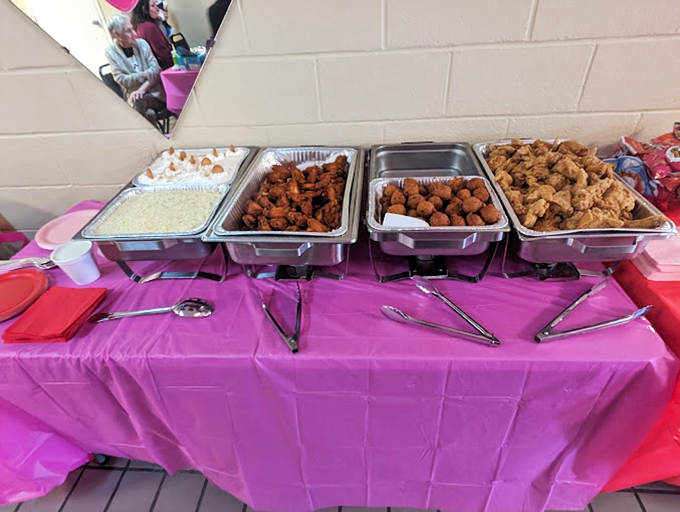 Buffet perfection lined up like soldiers ready for delicious duty. Just try walking past this spread without your stomach saluting.