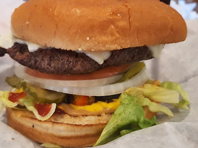 Architecture that makes structural engineers weep &ndash; layers of flavor stacked with the precision of a burger Jenga master.