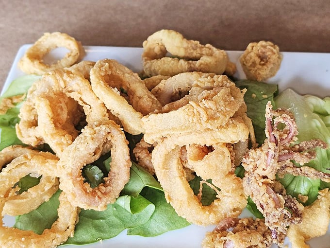 Calamari so perfectly fried it could convert even the most stubborn seafood skeptic. Crispy on the outside, tender within &ndash; the textural holy grail.