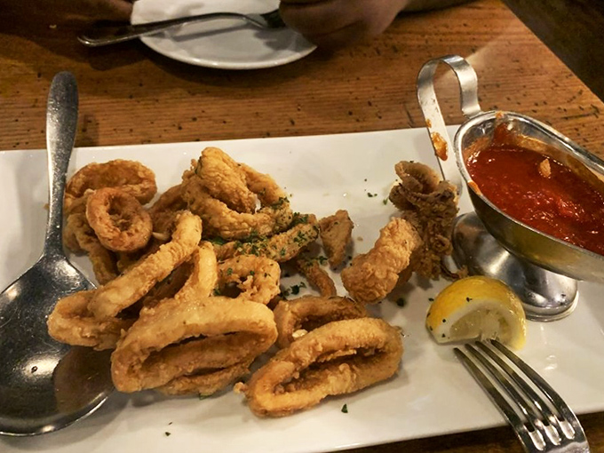 Calamari that's actually tender, not rubber bands in disguise – served with a marinara that deserves its own fan club.