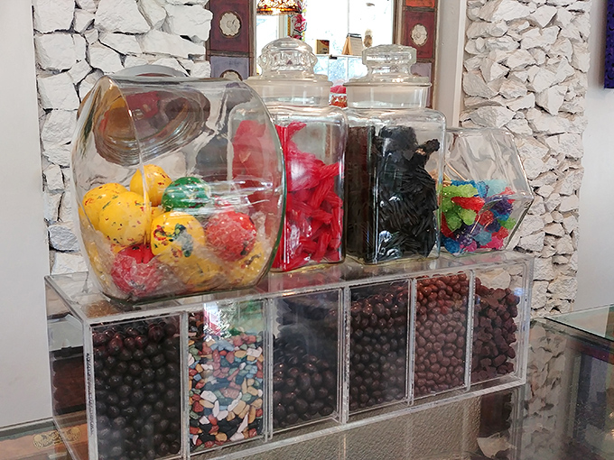 The stained glass windows create a cathedral-like atmosphere, making your candy selection feel like a sacred ritual. Hallelujah for hard candies!