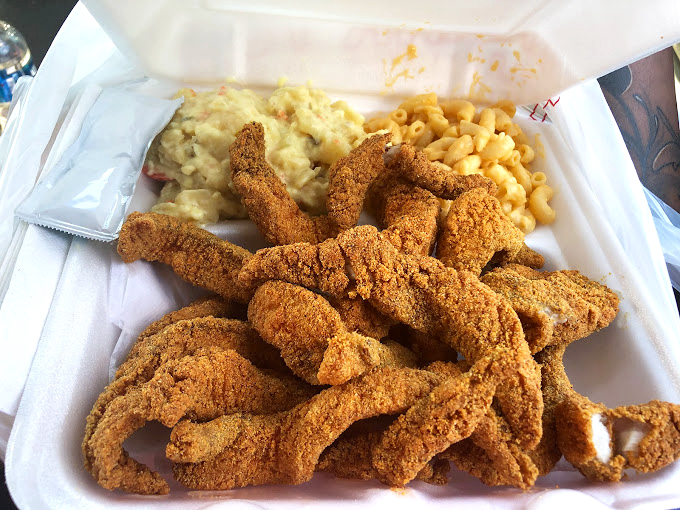 This isn't just a meal; it's an edible work of art. Golden-fried catfish with sides that'll make you forget you're in Kansas, not New Orleans.