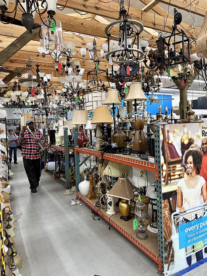 Lampshade jungle meets chandelier forest. Standing here feels like being in the lighting department of Liberace's fever dream.