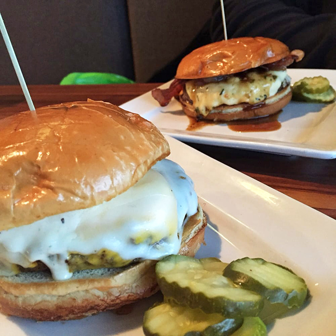 Two perfectly melted slices hugging a juicy patty between toasted bread &ndash; the patty melt is comfort food's answer to a warm embrace.