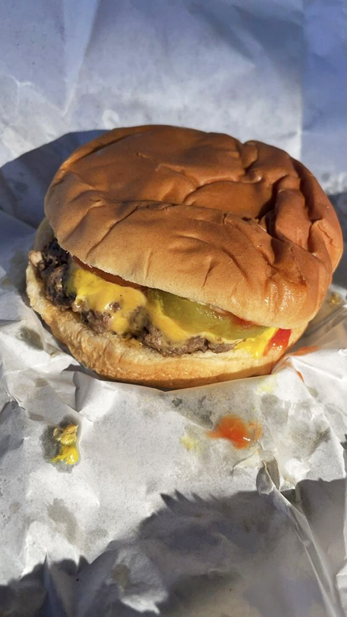 Simple perfection: a burger cooked on a grill that's seen more history than most Charlotte neighborhoods.