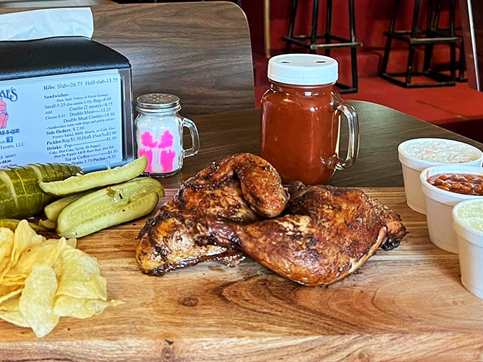 Chicken that's clearly lived its best life before becoming your dinner. Served with pickles, chips and sides in portions that say "Kansas knows how to feed its people."