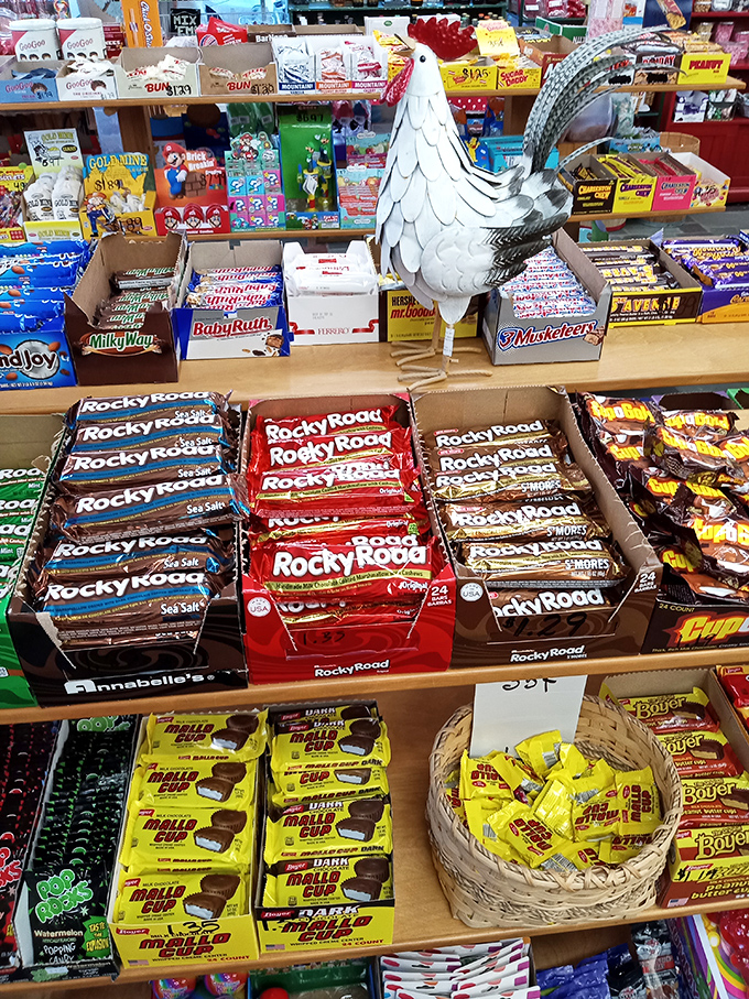The chicken figurine seems to be saying, "Don't put all your Rocky Road in one basket!" Wise advice in a candy wonderland.