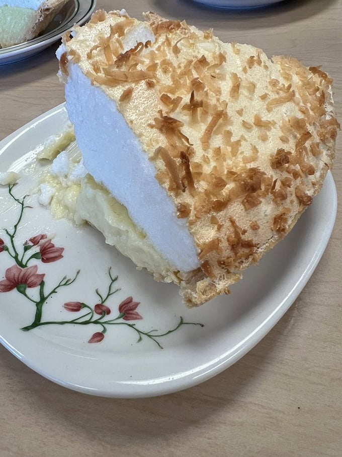 This coconut cream pie with its towering meringue belongs in the Smithsonian. The toasted coconut flakes on top are the crown jewels of the dessert kingdom.