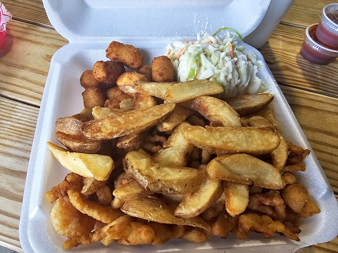 A seafood combo that answers the eternal question, "Why choose one when you can have it all?" Hushpuppies included, as nature intended.