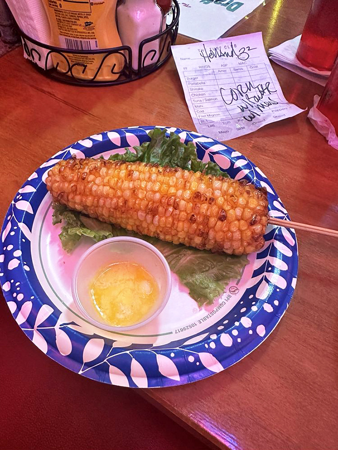 Corn on the cob gets the VIP treatment at The Turf Club. Butter melting like a sunset over golden kernels.