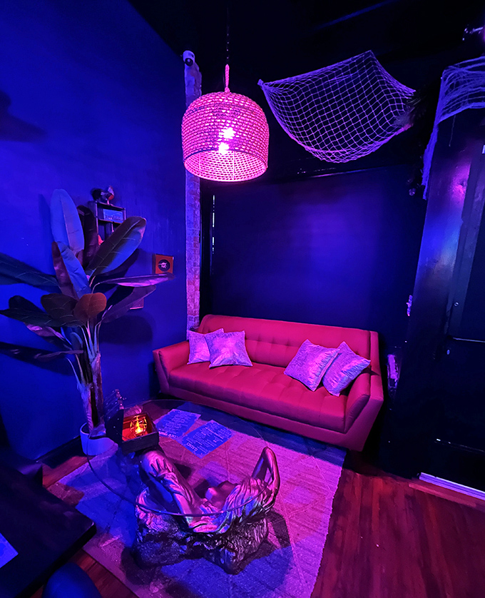 The coral couch corner looks like it was stolen from Poseidon's living room &ndash; complete with fishing nets that caught nothing but good vibes.