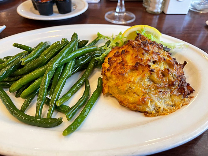 The famed Maryland crab cake with green beans &ndash; proof that sometimes the simplest presentation lets the star ingredient shine brightest.