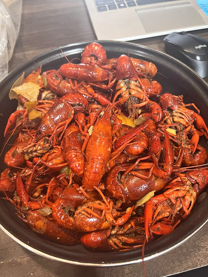A mountain of crawfish, red as sunset and twice as beautiful. This is what dreams look like to Cajun angels.