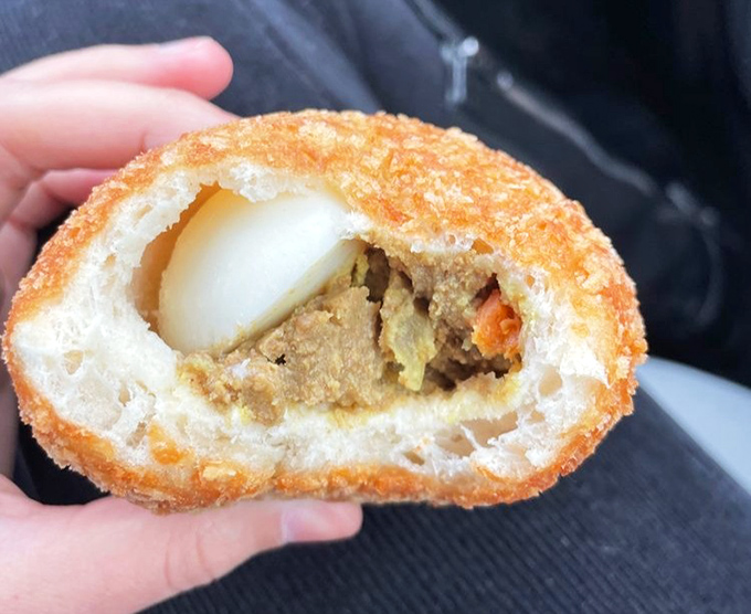 Cut into this curry donut and witness the miracle. It's like Japan and India had a delicious baby that somehow ended up in Ohio.