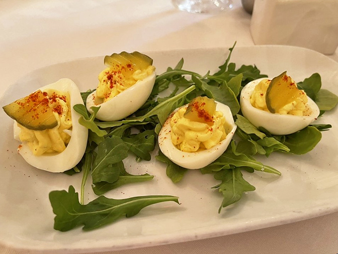 Deviled eggs get a gourmet promotion at Magnolias, reclining on peppery arugula like little protein royalty getting a well-deserved spa day.