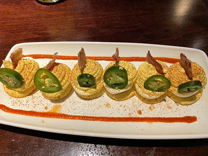 Deviled eggs wearing jalape&ntilde;o hats and bacon accessories &ndash; proof that sometimes the most heavenly bites come with a devilish kick.