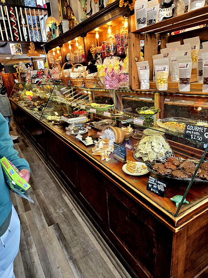 This isn't just a display case &ndash; it's a museum of edible art where chocolates, brittles, and taffies are arranged with the care usually reserved for precious gems.