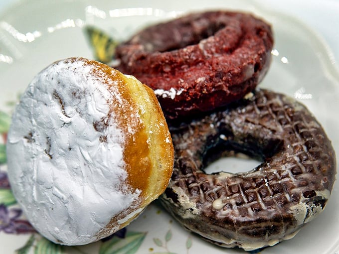 A plate of greatest hits&mdash;black and white, red velvet, and chocolate glazed. The donut equivalent of a classic rock concert.