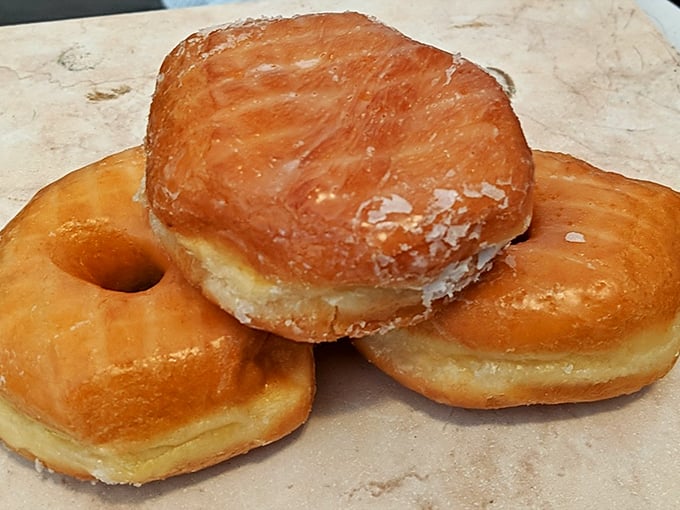 The chocolate-glazed versus classic glazed debate has divided families for generations. The solution? Get both. Always get both.