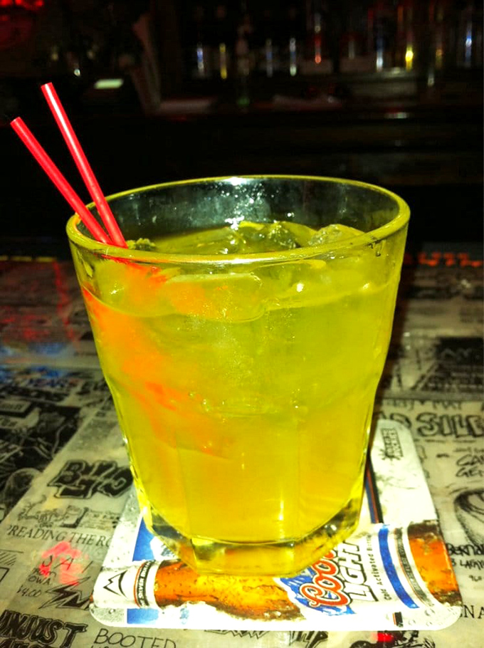 A radioactive-looking cocktail that glows like the backglass of a 70s pinball machine—drinks here are as playful as the games themselves.