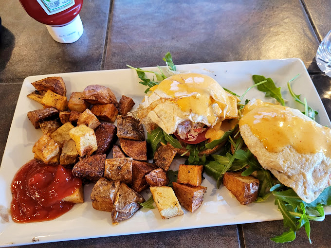 Home fries that achieve the impossible: crispy exterior, fluffy interior. Paired with eggs that look like they were poached by someone who actually cares.
