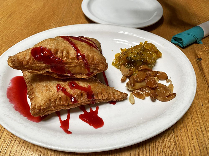 These empanadas aren't just fried pastry pockets; they're little treasure chests of brie and chile apricot chutney that make sharing a moral dilemma.