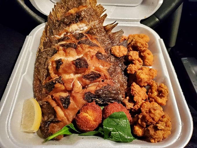 When your plate arrives with collard greens and mac and cheese alongside that magnificent fish, you know you've found the real Georgia.