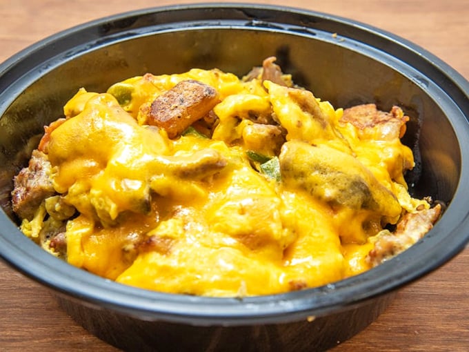 The breakfast sandwich that rivals your grandmother's cooking. Golden eggs, melted cheese, and fresh veggies on a bagel that deserves its own hall of fame