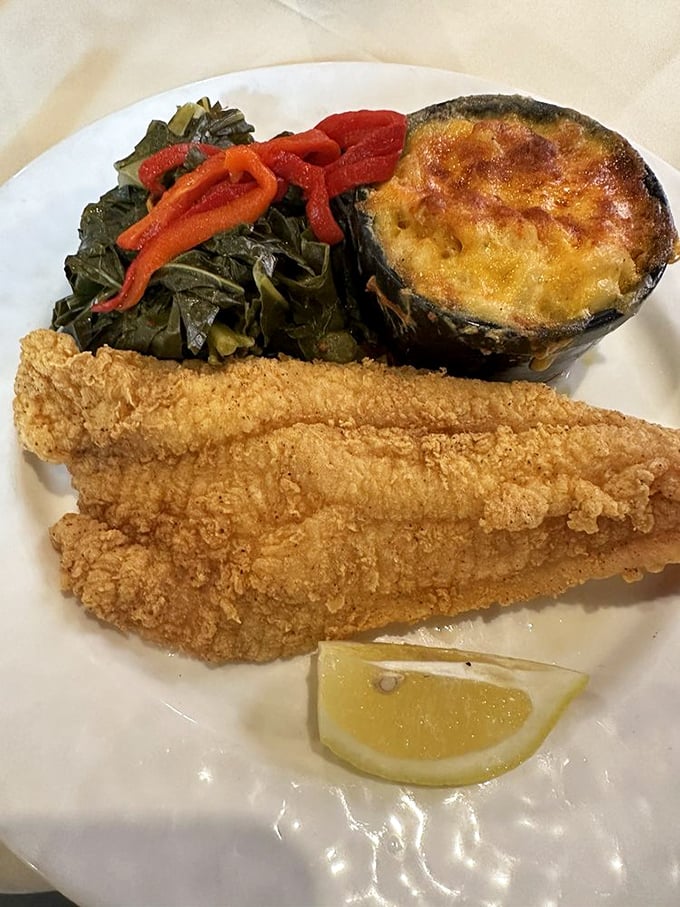 Golden-fried catfish that would make Mississippi jealous, paired with collards that could convert any vegetable skeptic.