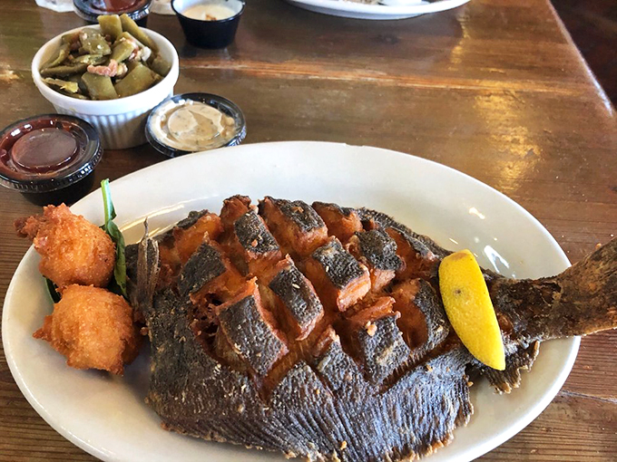 This isn't just fried flounder—it's coastal Georgia on a plate, complete with hushpuppies that deserve their own fan club.