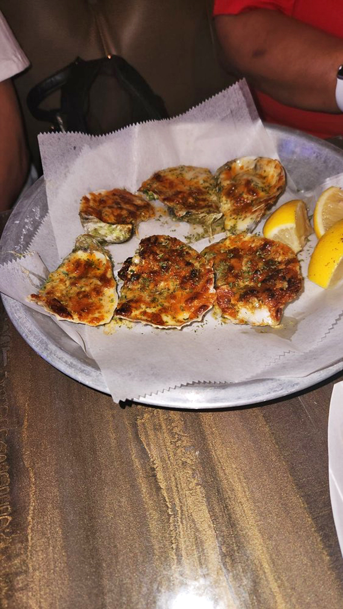 Baked oysters that have clearly been to flavor finishing school&mdash;dressed up and ready to party with herbs, cheese, and a hint of spice.
