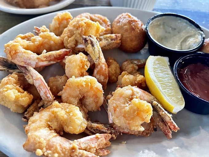 Georgia shrimp wearing their golden-fried Sunday best, waiting to take a dip in that sauce. Formal attire for an informal feast.