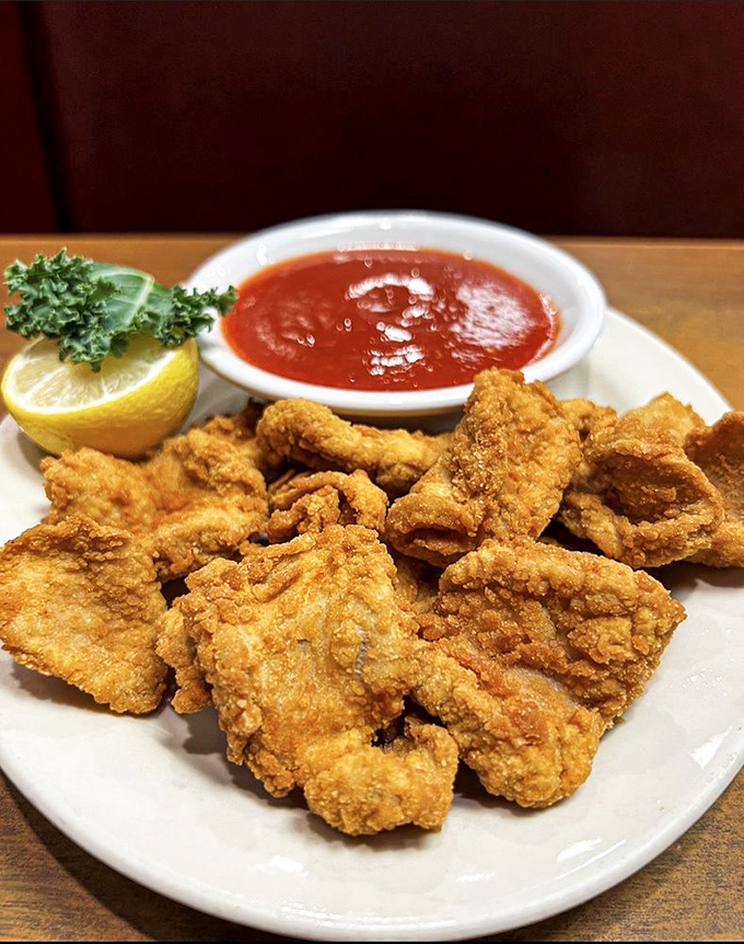 Crispy, golden-fried treasures served with cocktail sauce&mdash;a delicacy that requires both culinary courage and a sense of adventure to fully appreciate.