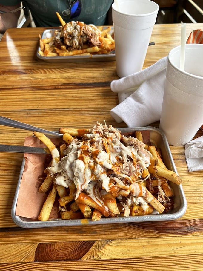 These loaded fries aren't just a side dish&mdash;they're a main event, with pulled chicken and sauce performing culinary acrobatics on every crispy bite.