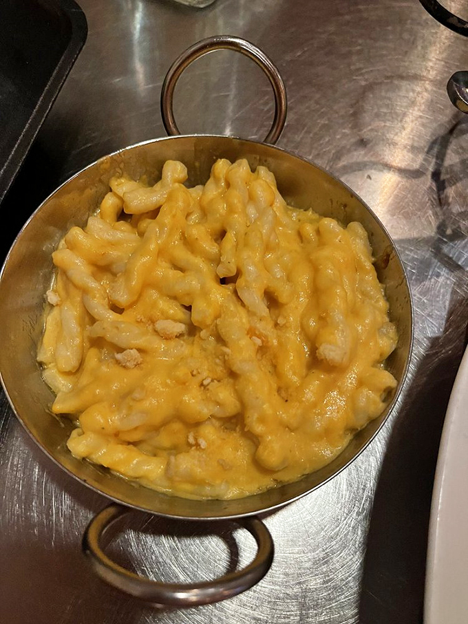 Mac and cheese elevated from childhood memory to grown-up indulgence. The copper serving dish says "sophisticated," but your face will say "pure joy."