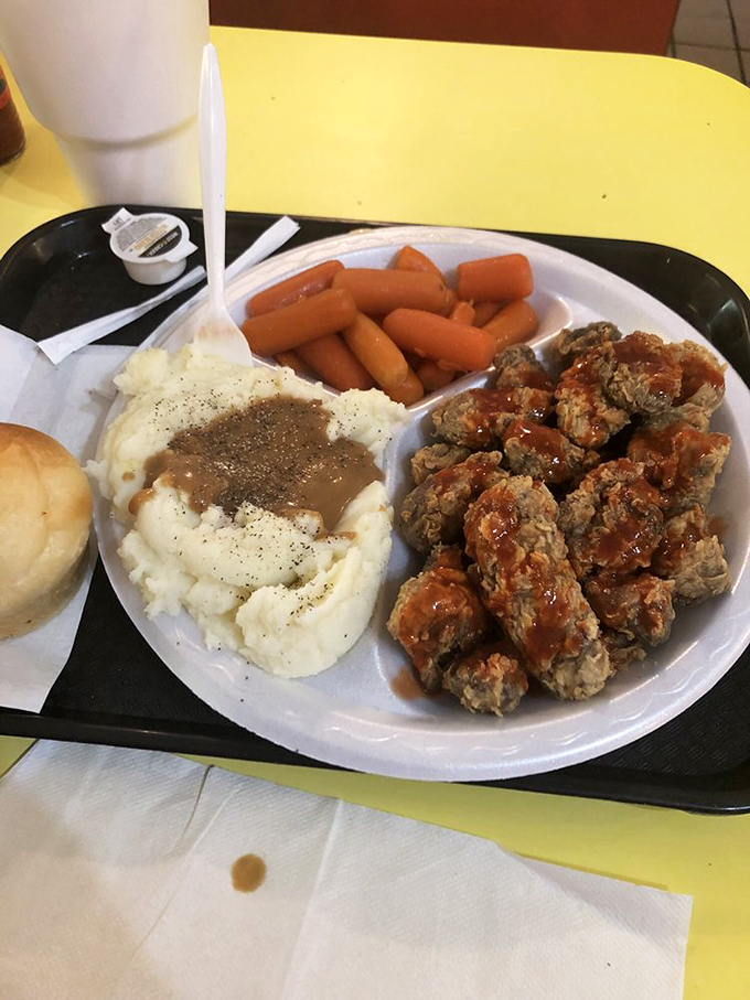 Buffalo-style bites alongside creamy mashed potatoes and bright orange carrots. A color palette that would make both your stomach and eyes happy.