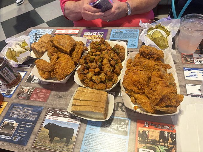 Table real estate has never been more precious. Fried okra, chicken, and all the fixings create a landscape of comfort that feels like a warm hug.