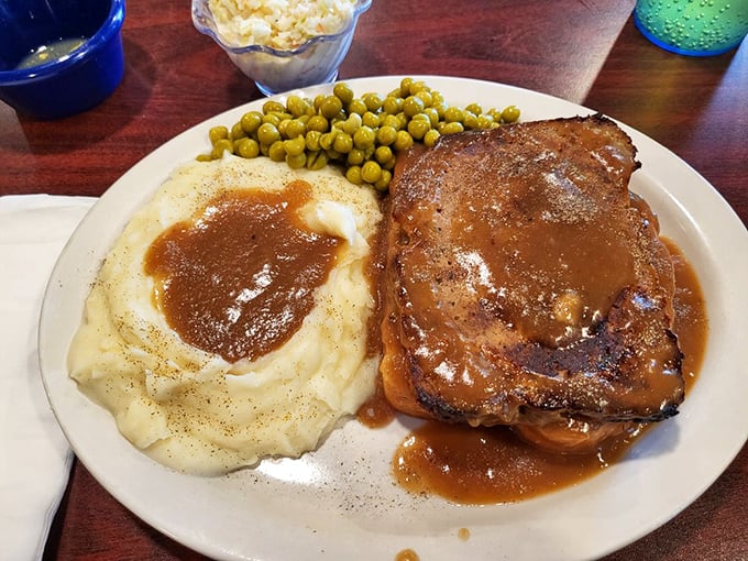 Meatloaf and mashed potatoes&mdash;comfort food that whispers, "Everything's going to be okay." That gravy could solve international conflicts if given the chance.