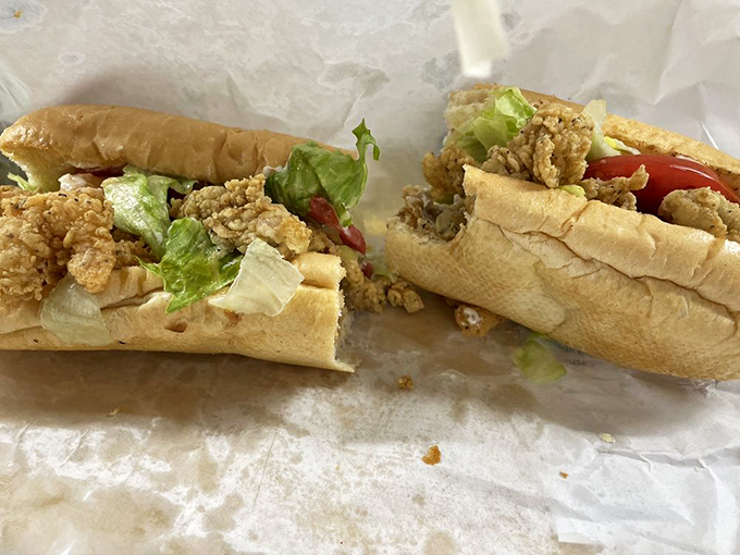 The oyster po'boy: where crispy fried seafood meets fresh veggies on pillowy bread. It's sandwich architecture that should win design awards.