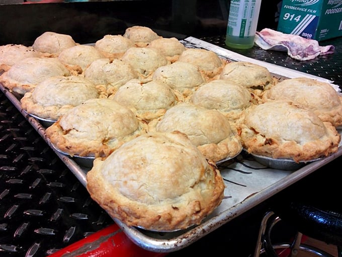 Fresh-baked hand pies waiting for their forever homes. These portable pastries prove good things really do come in small packages.
